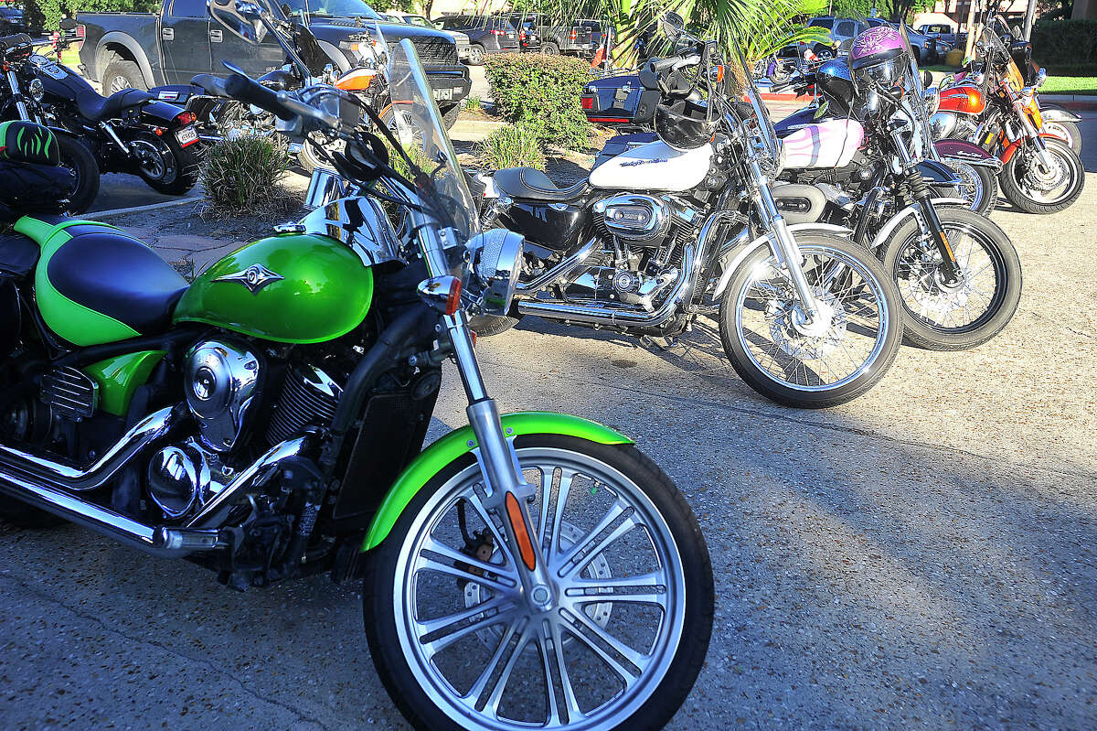 Women motorcyclists gather for a pre-rally meet and greet Thursday night