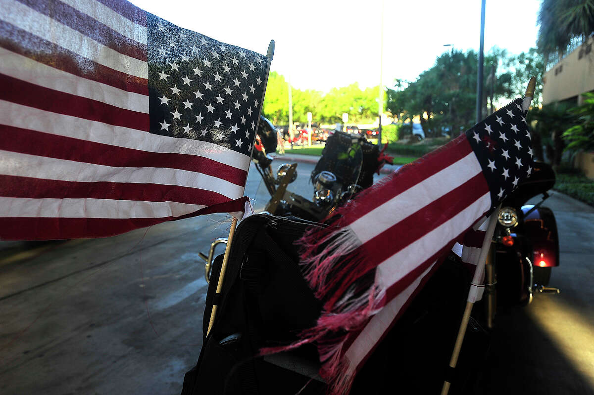 Women motorcyclists gather for a pre-rally meet and greet Thursday night