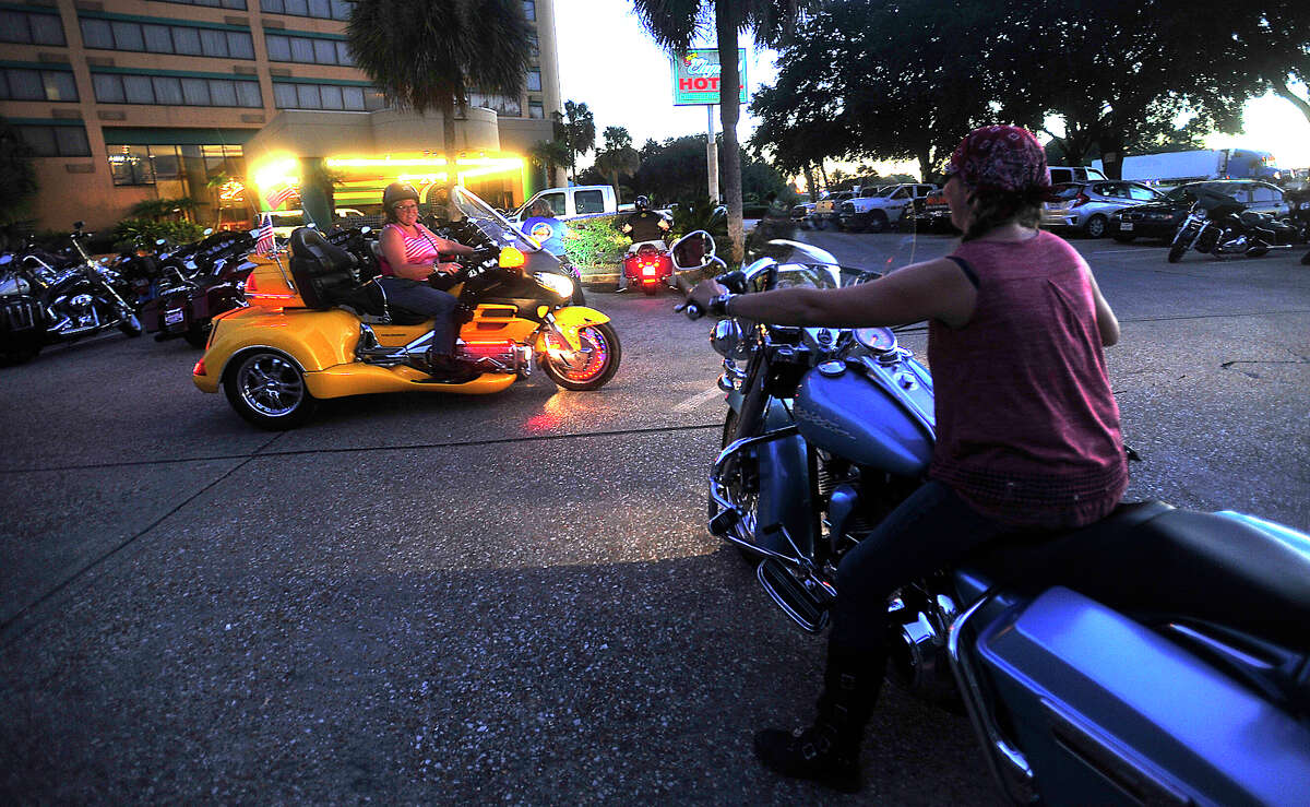 Women motorcyclists gather for a pre-rally meet and greet Thursday night