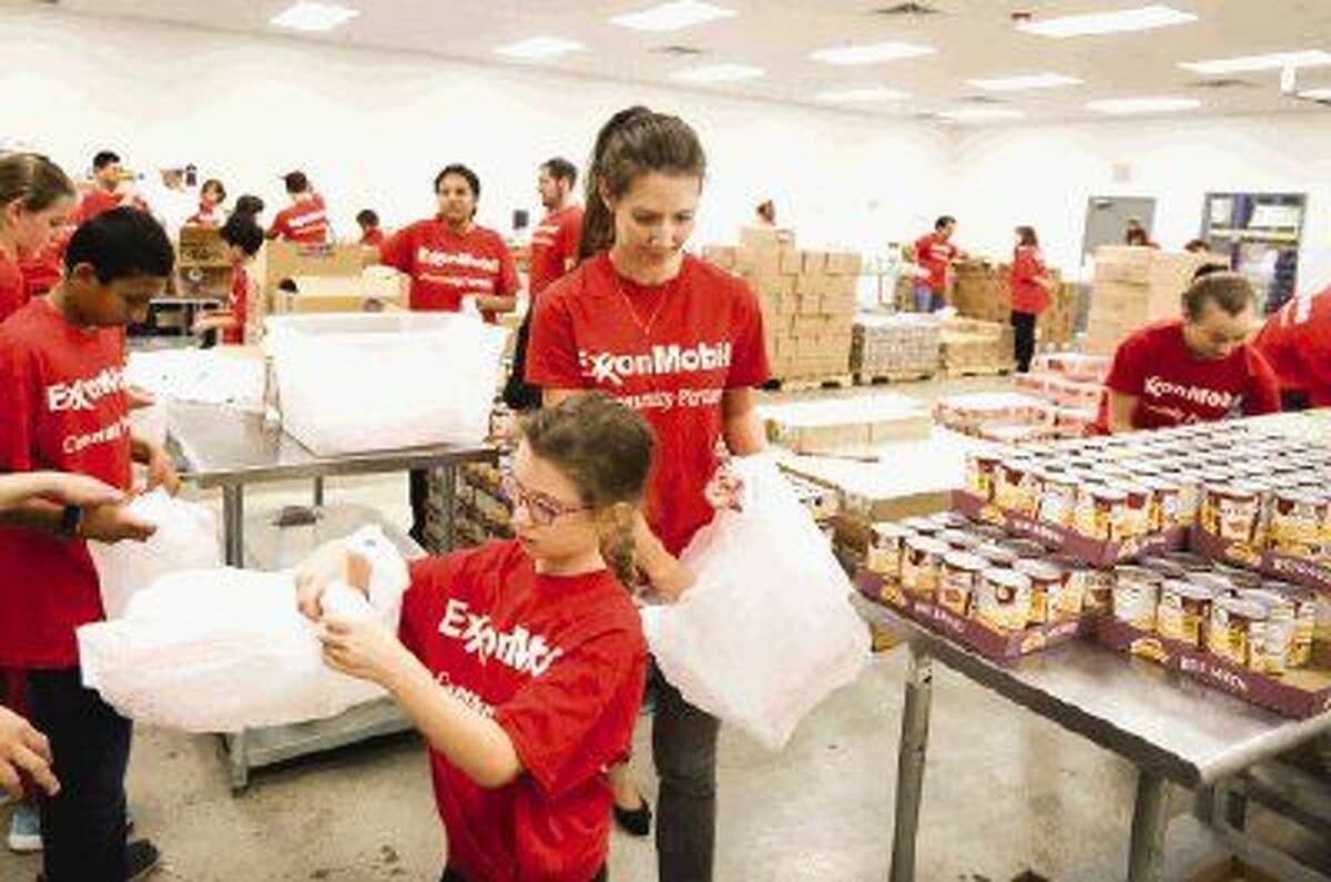 ExxonMobil helps Montgomery County Food Bank pack meals
