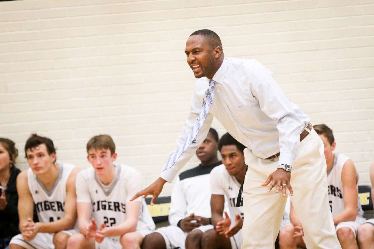 BOYS HOOPS: Lewis drives Conroe to 72-54 victory over Magnolia