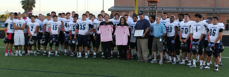 Clements football team donates breast cancer shirts to Methodist Hospital