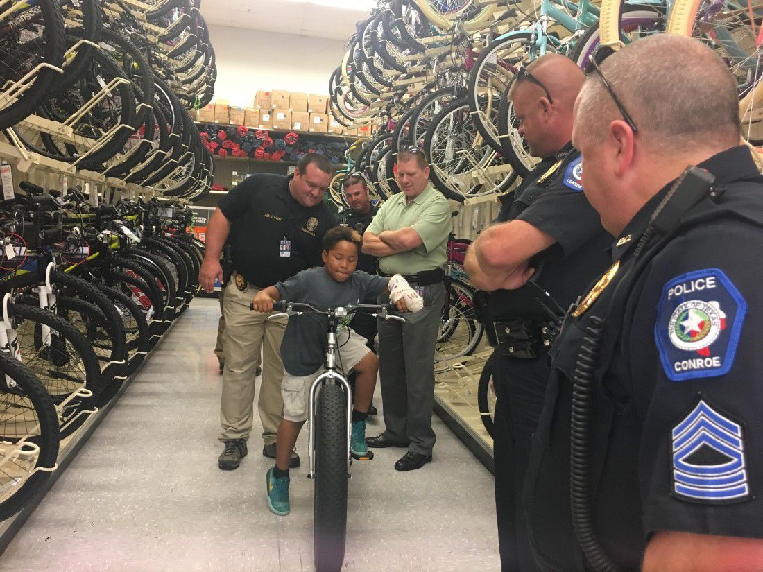 Conroe PD gives injured boy a new set of wheels
