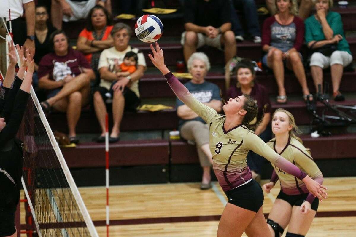 VOLLEYBALL: Magnolia outlasts rival Magnolia West VOLLEYBALL: Magnolia outlasts rival Magnolia West