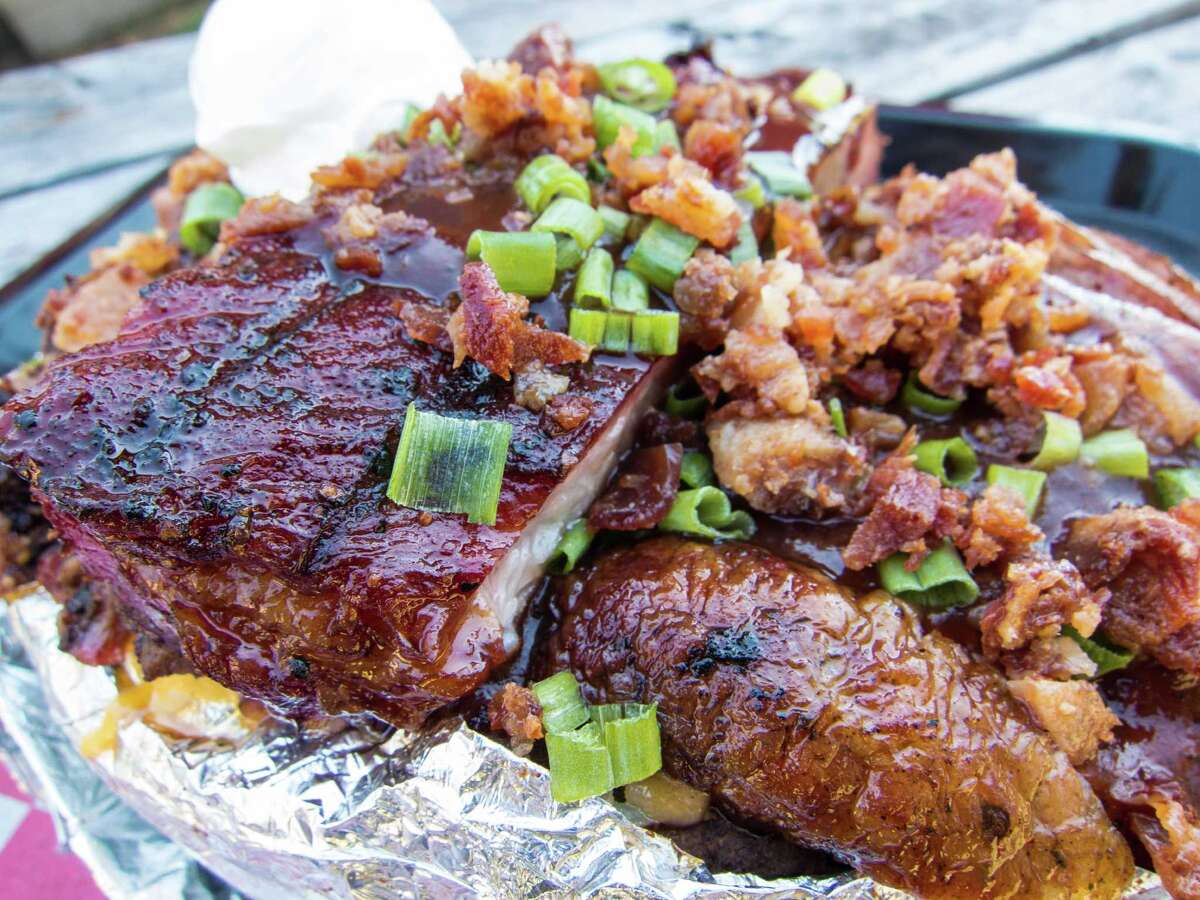 Loaded baked potatoes are the workhorse of Texas barbecue-joint menus