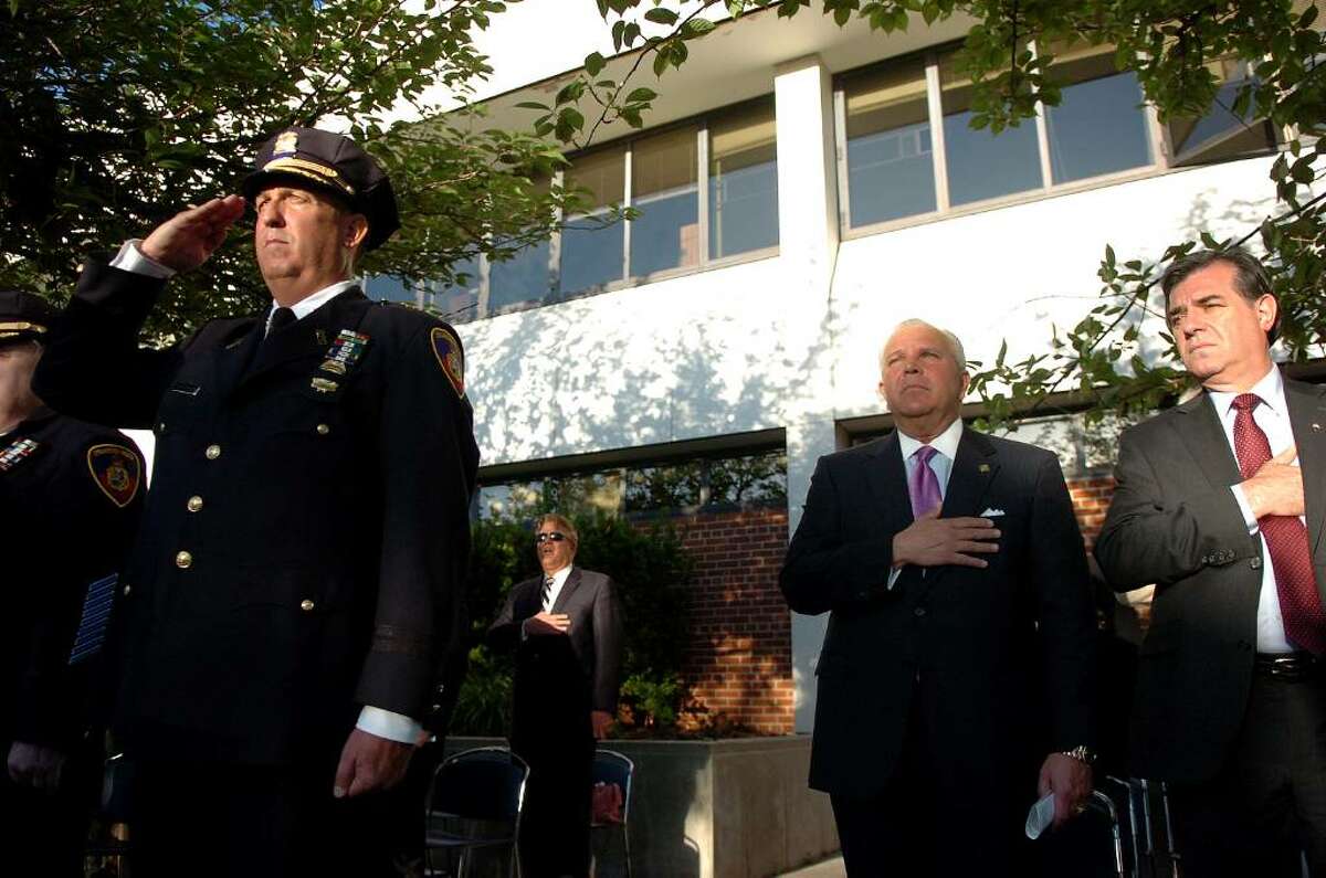 Stamford police parade turns streets blue and red