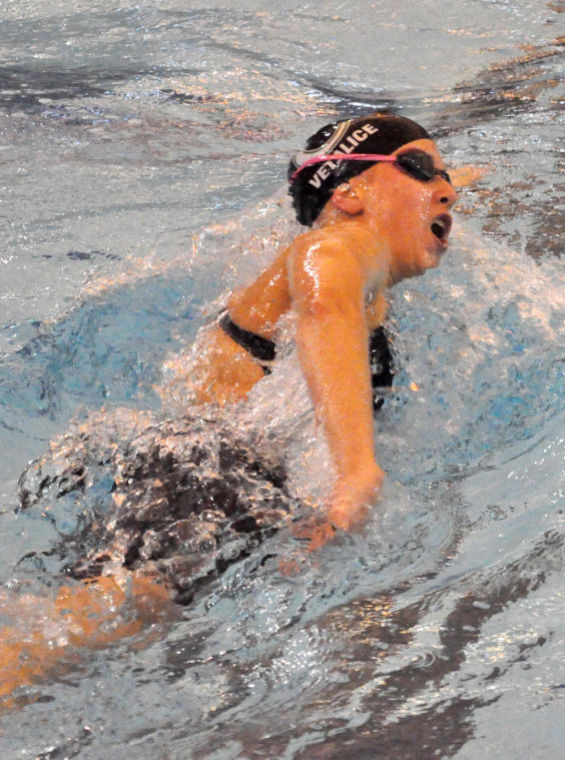Cooper swimmer sets two school records in first meet of the season