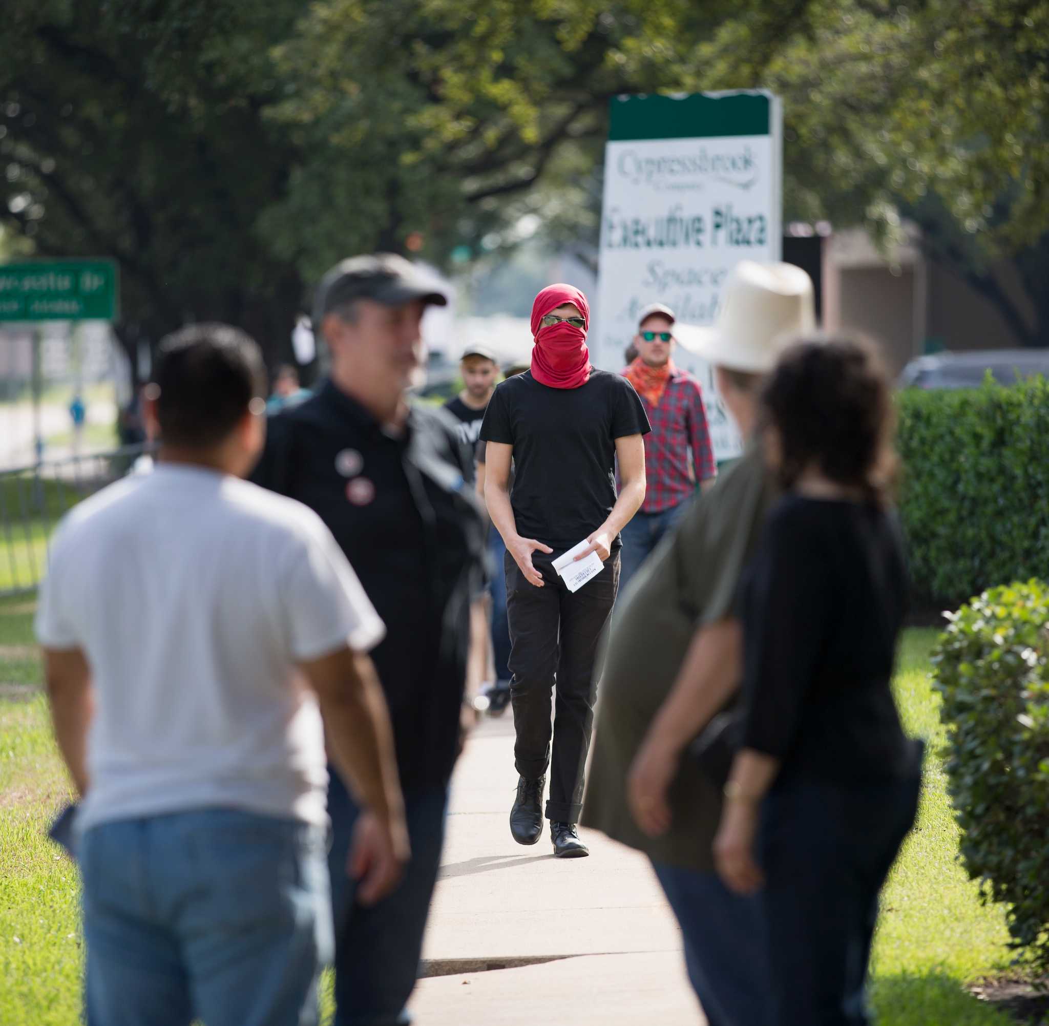 White Lives Matter, Black Lives Matter face off outside Houston's Anti ...