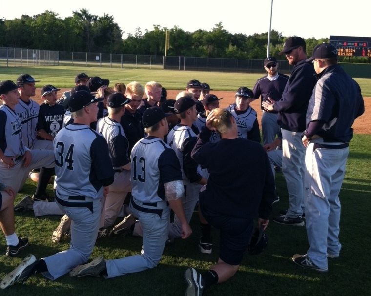 Huggins coaches the Wildcats with heart