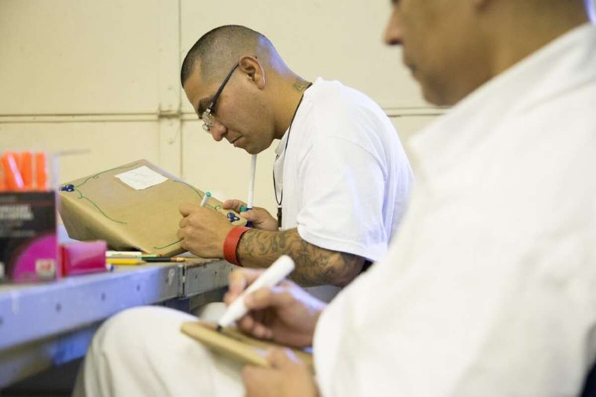 Inmates lend hands, talents to Christmas charity