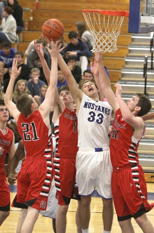 BASKETBALL: Taylor stops Memorial for first district win