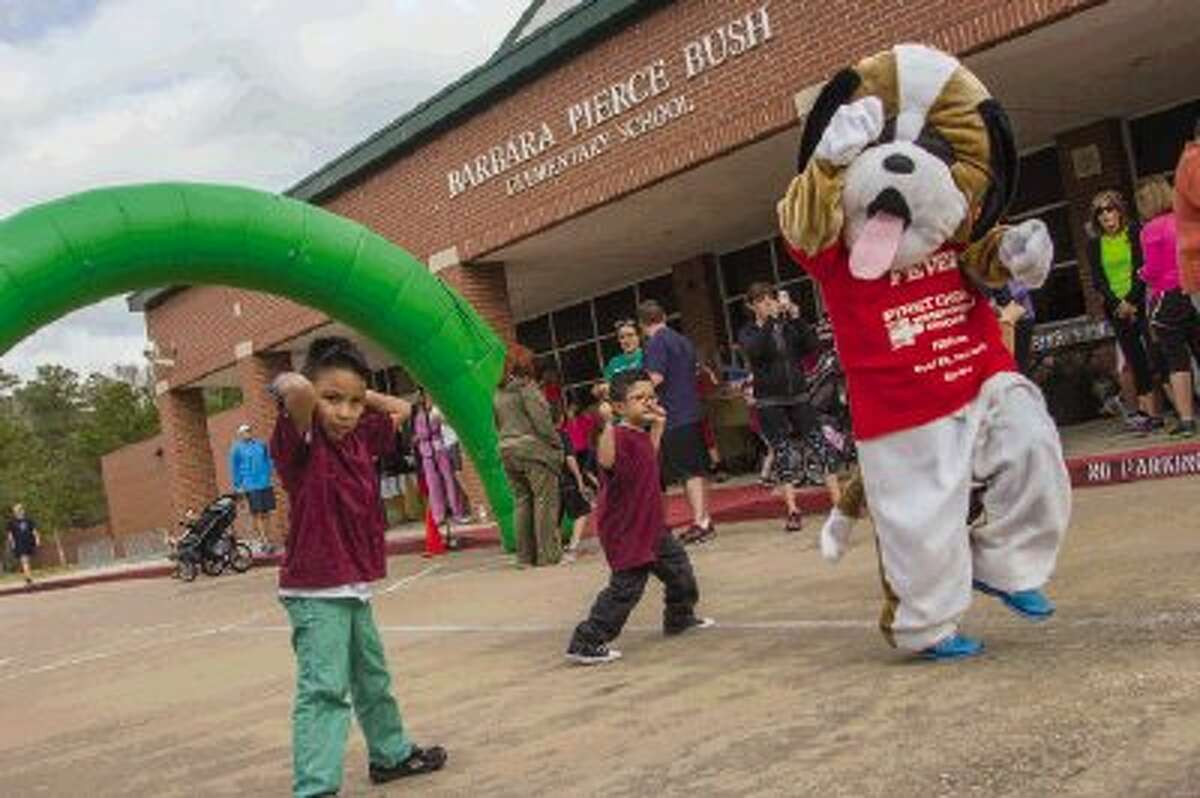 Area residents run, walk to benefit child suffering from bone cancer