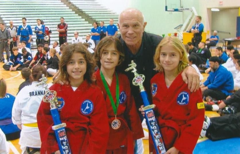 Huffman’s Davis triplets perform well at Karate tournament