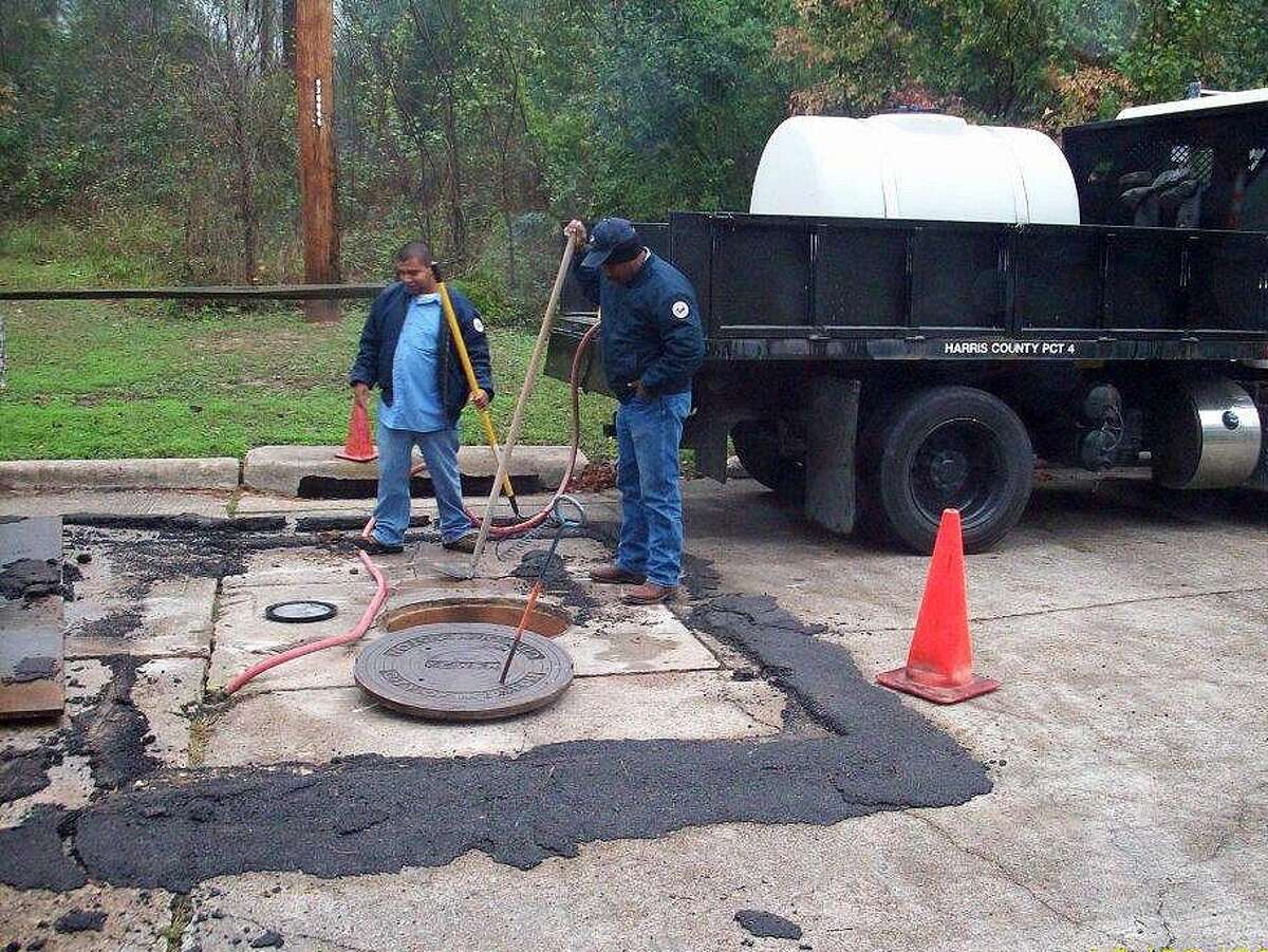 Crews seal leaking storm sewer pipe to prevent soil erosion