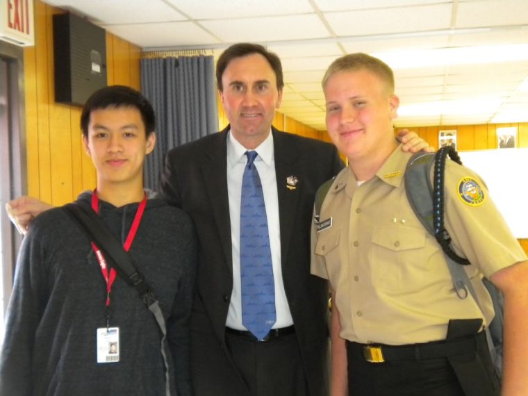 Olson addresses Navy Junior ROTC students at Dawson High