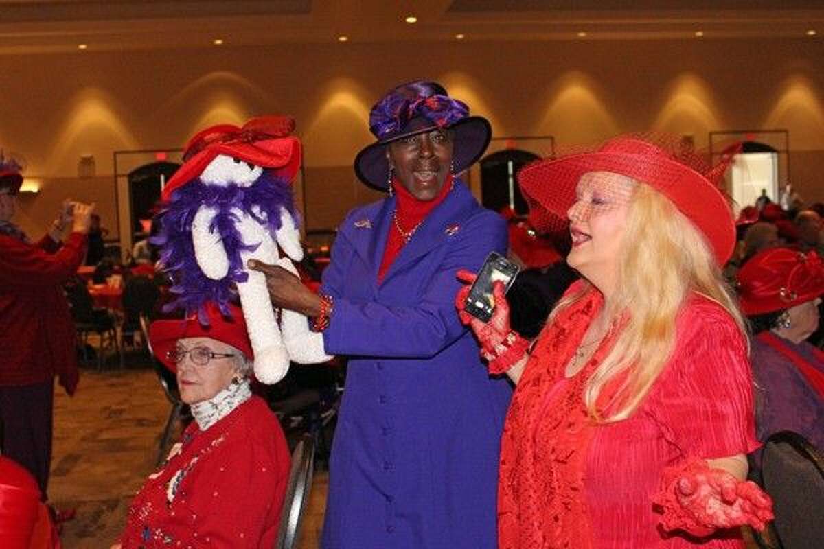 Red Hatters celebrate the Holidays with Glitz and Glamour