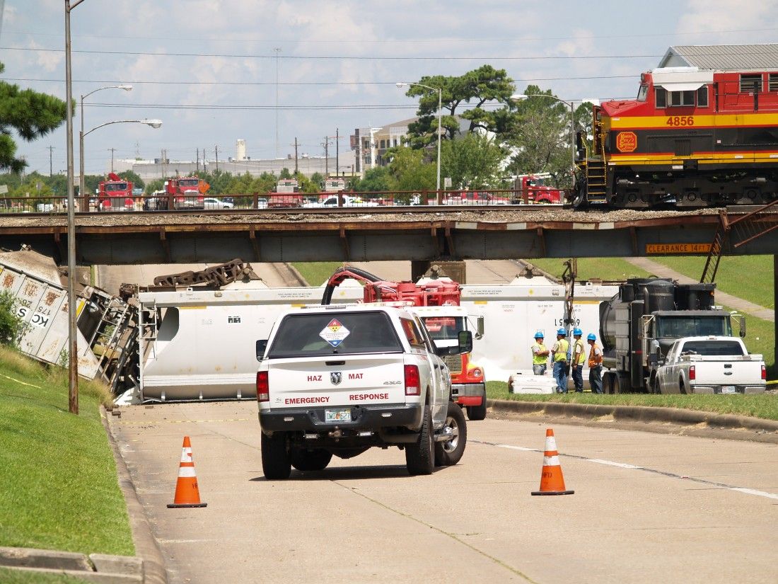 Train derails off bridge over Old Katy Road and Washington Avenue