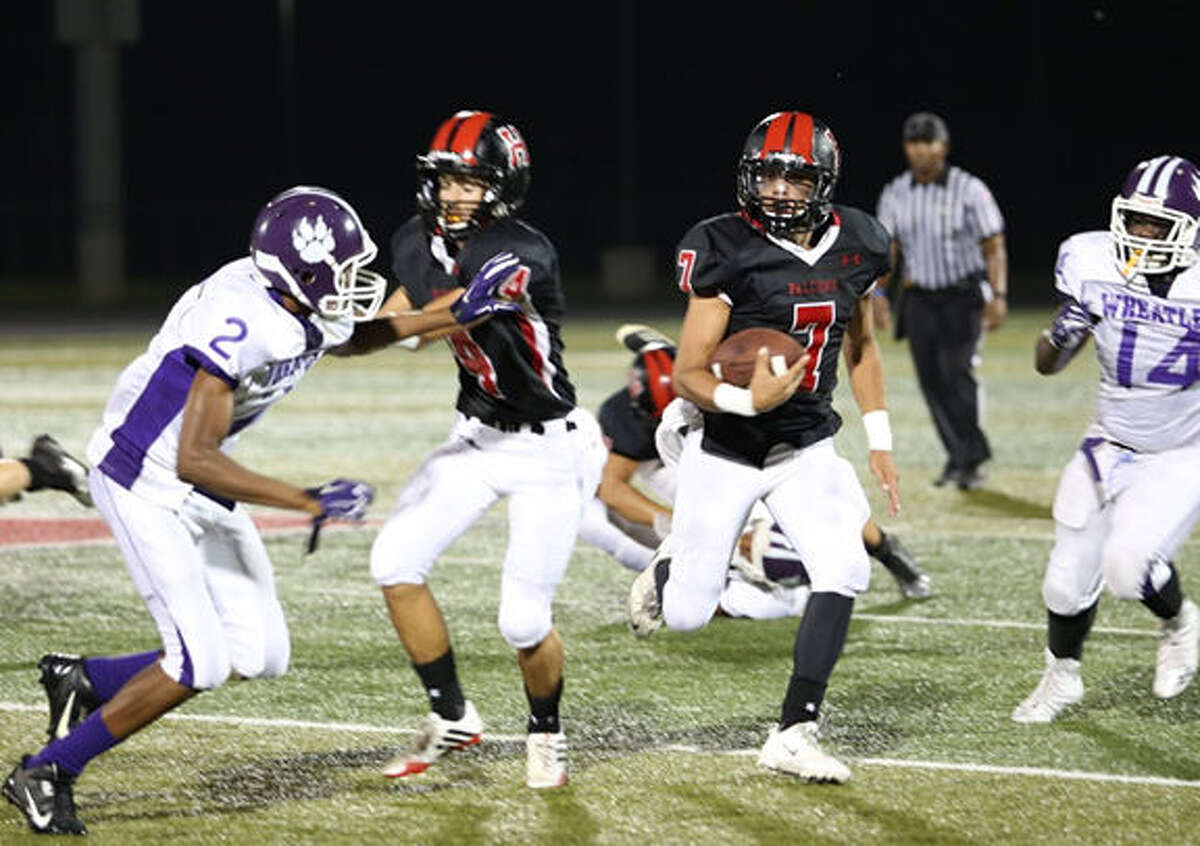 FOOTBALL: Huffman routs Houston Wheatley 57-21