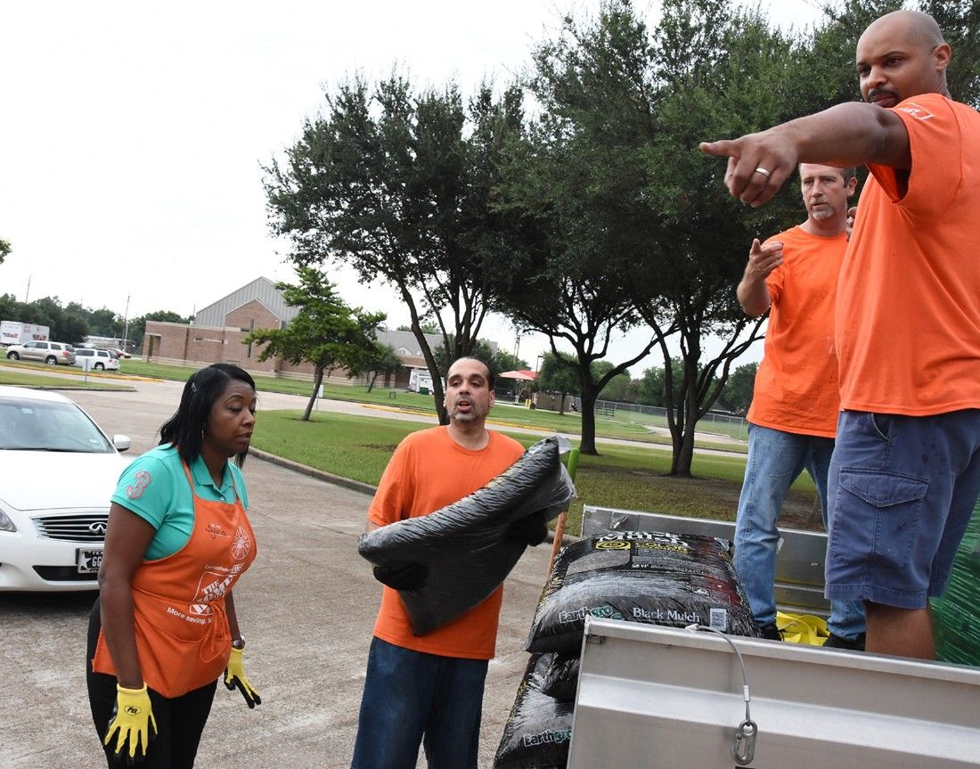 Home Depot volunteers beautify Francone ES for start of school year