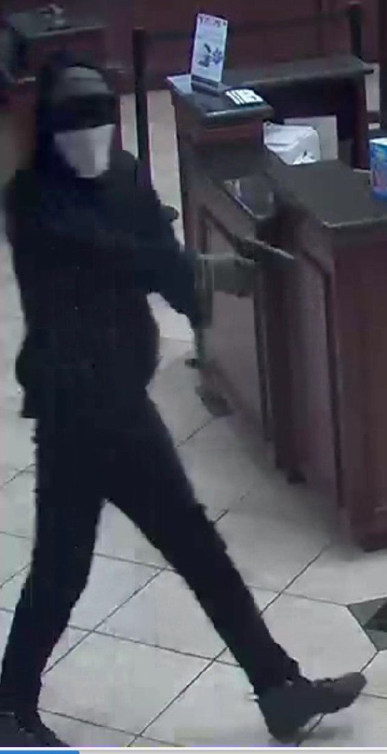 FBI releases photos in credit union robbery