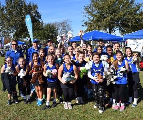 Pin Oak Middle School team gives back at tourney