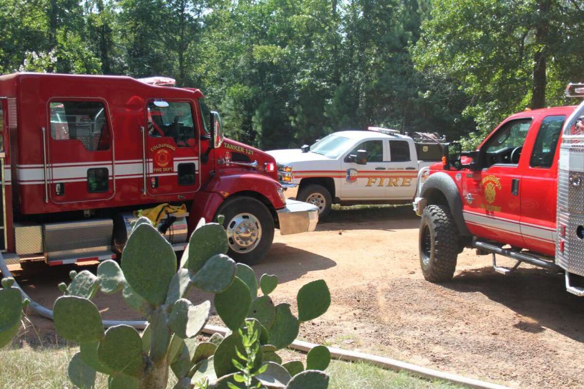 Brush fire contained, firefighters on alert because of dry conditions