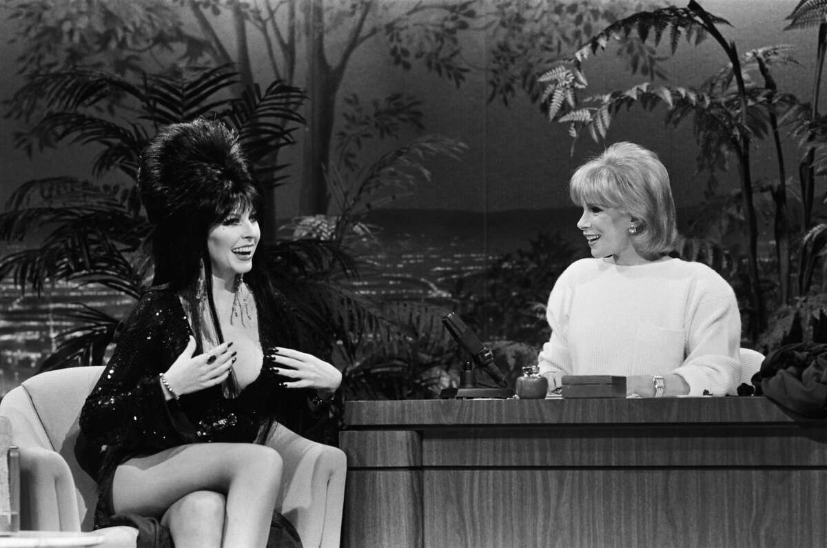 Spooky spunky Elvira celebrates 35 years of business with a 'coffin ...