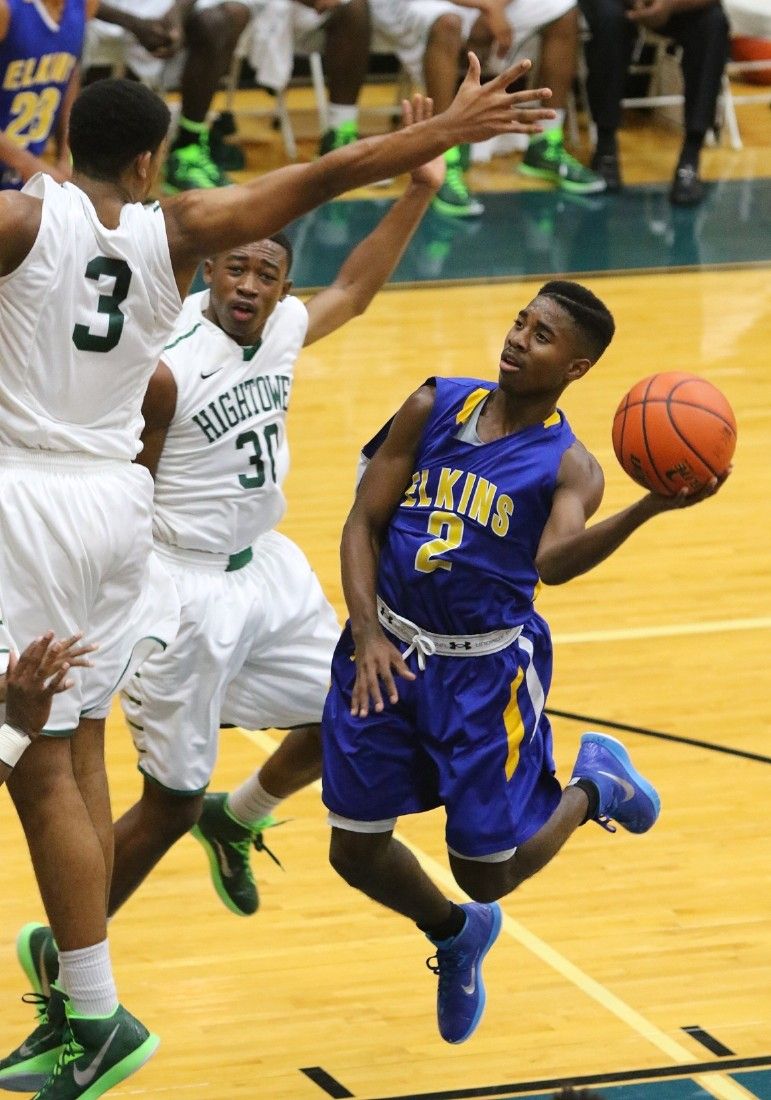 Travis takes FBISD trophy from Bush
