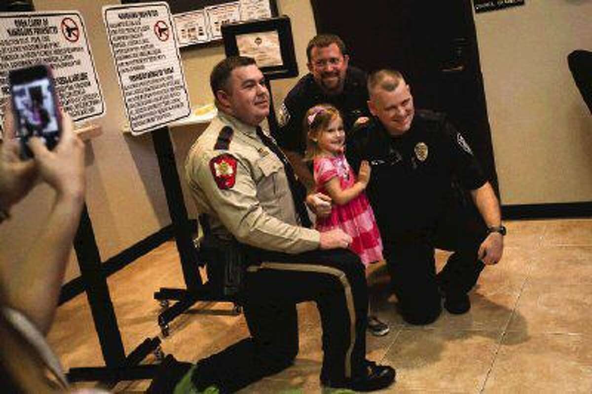 Officers honored for saving Oak Ridge North girl from drowning