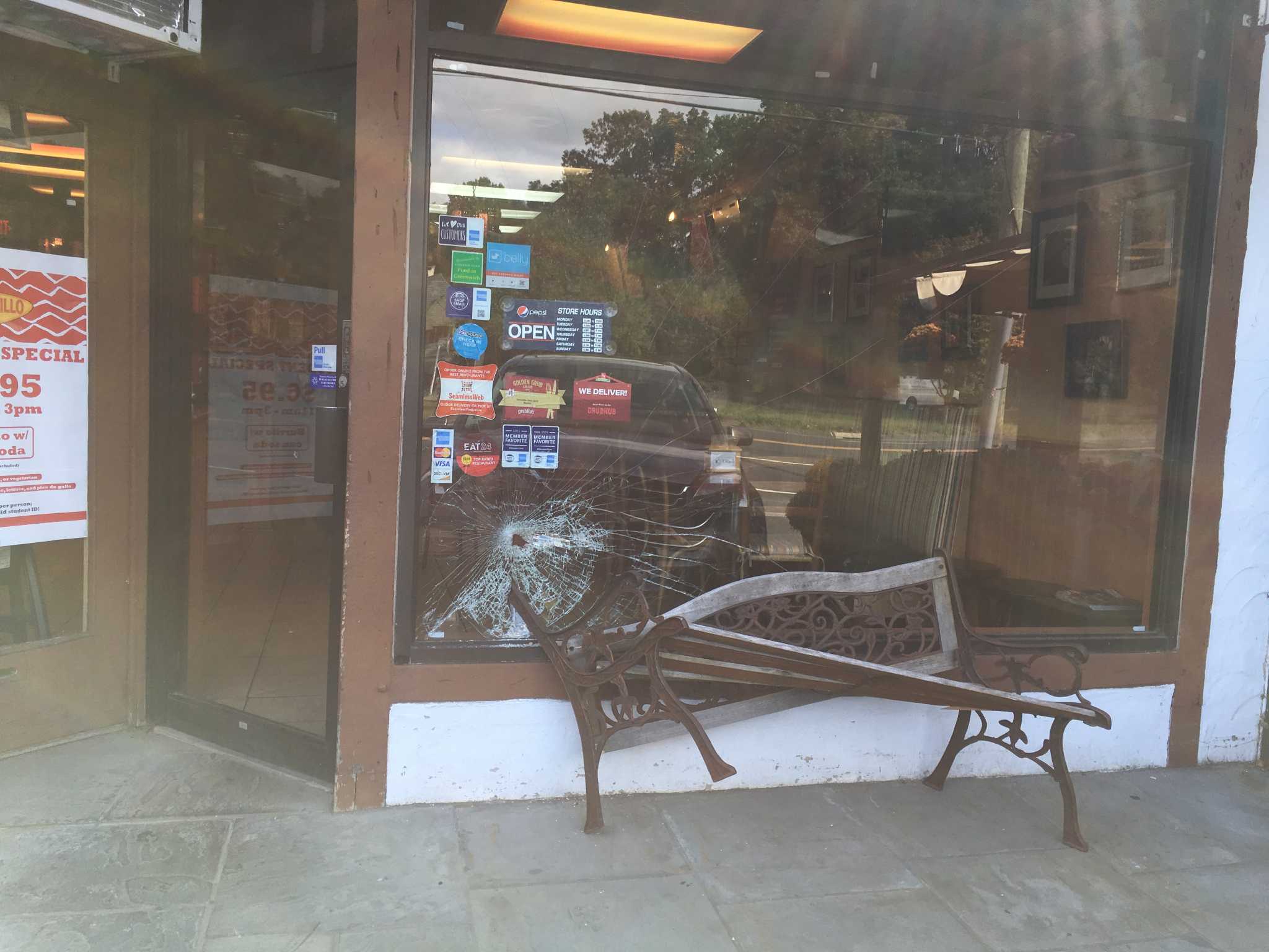 Bench smashed through storefront after Cos Cob car crash