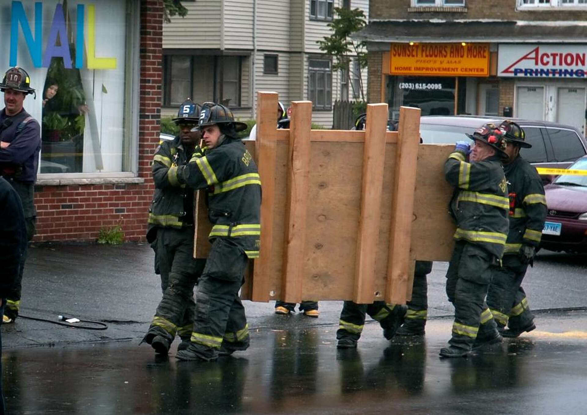 Forklift removes obese man's body