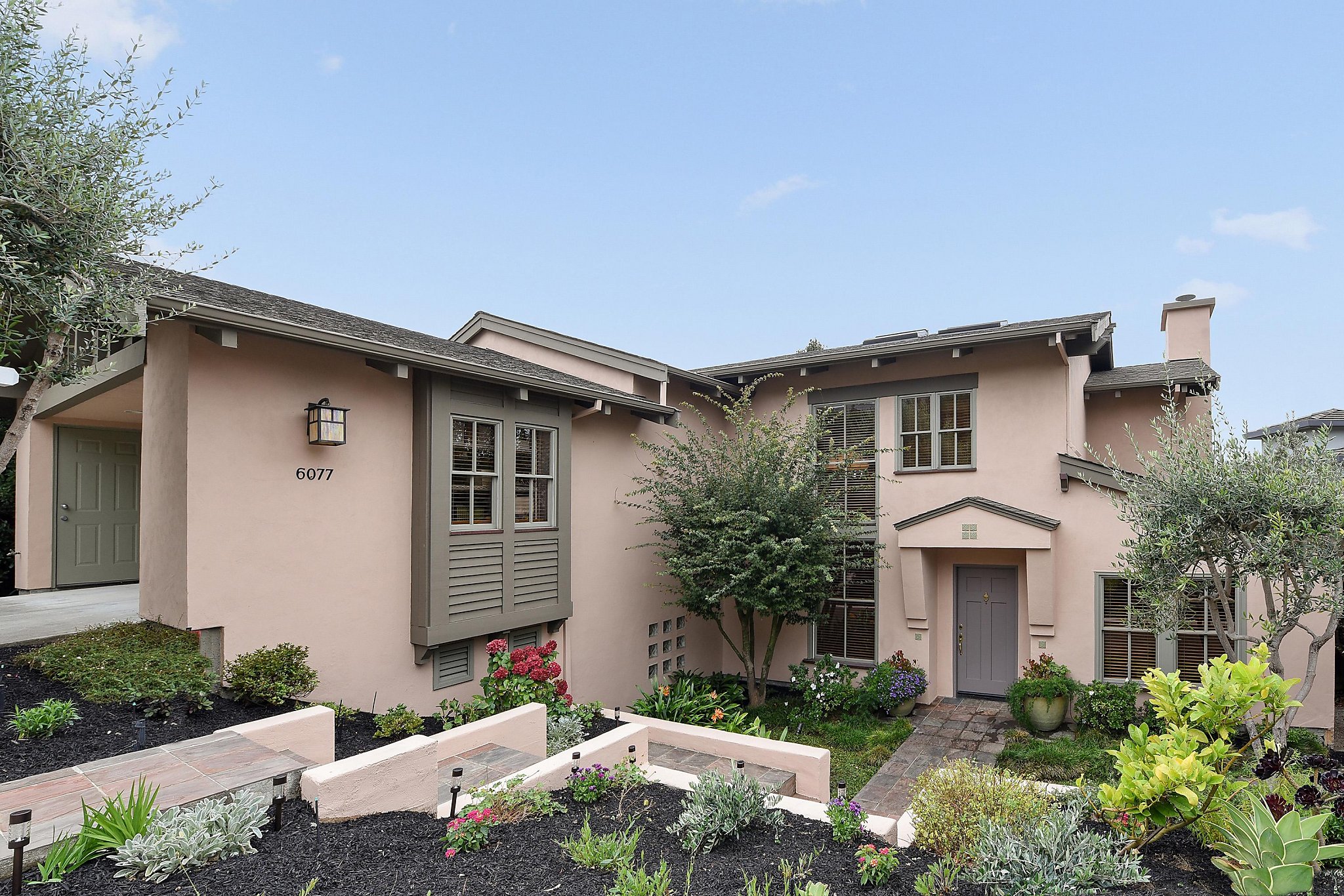 Vibrant landscape surrounds hillside contemporary