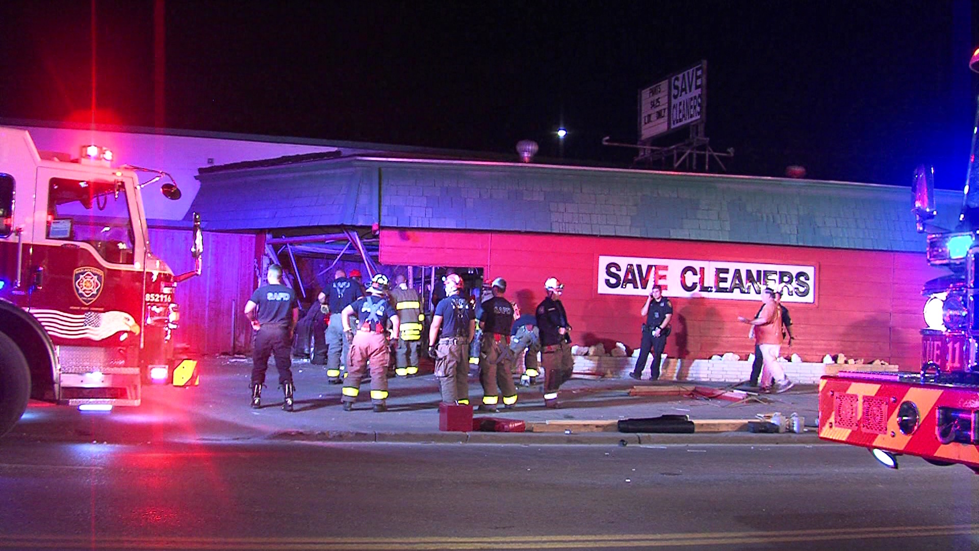 SAPD: 2 hospitalized after car barrels into dry cleaning building