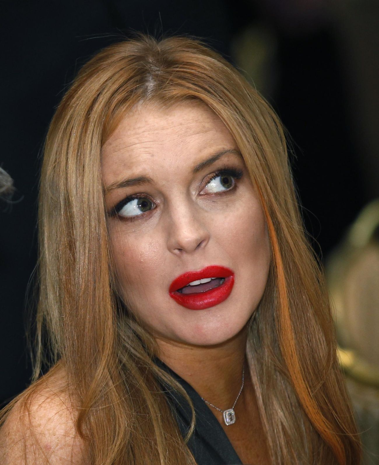 Lohan charged with leaving scene of NYC accident