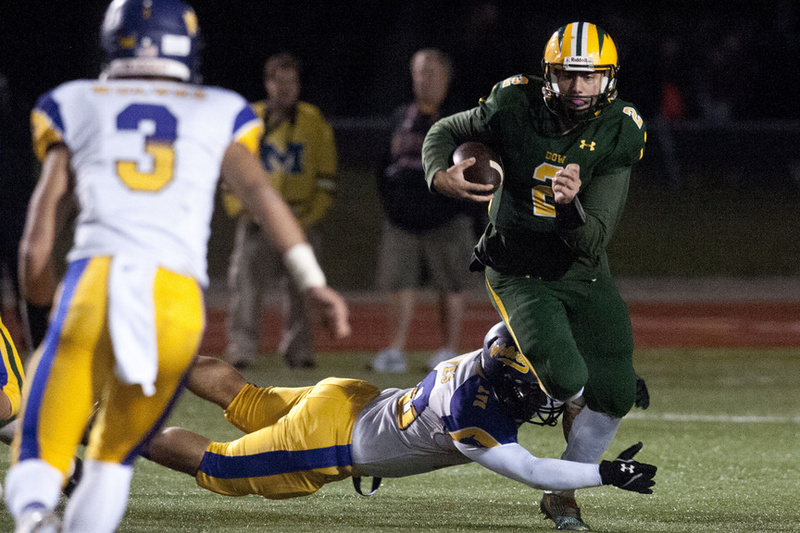 Dow football pulls away to rout BCC in playoff opener