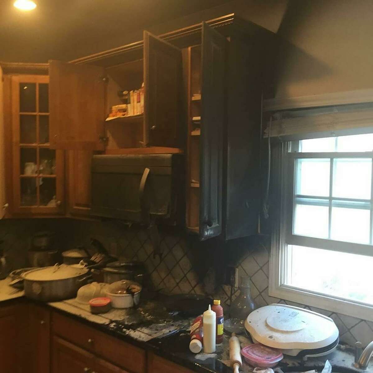 Monroe firefighters battle kitchen fire on busy morning