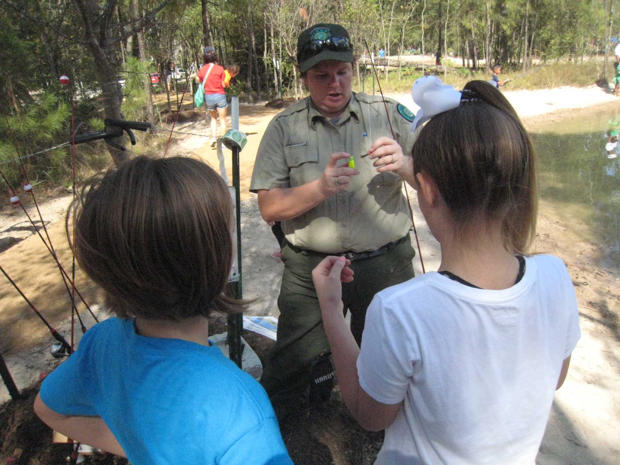 The Groves celebrates opening of fish camp, pond