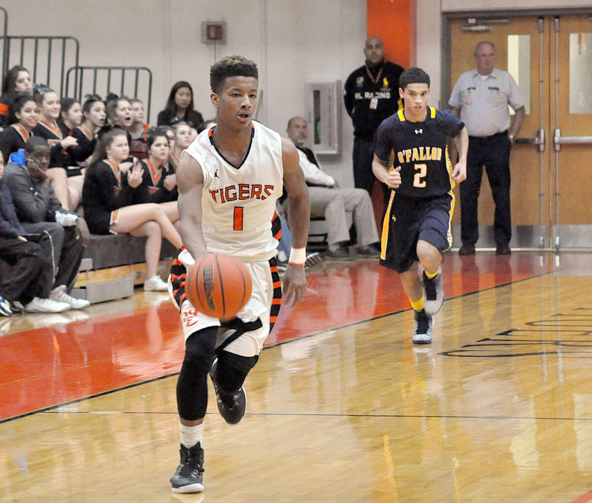 BOYS' BASKETBALL: Senior duo fills point guard role for E’ville