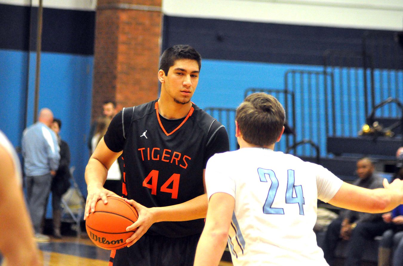 BOYS' BASKETBALL: Tigers end regular season with win over East