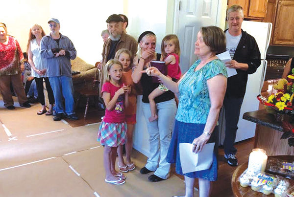 Worden family moves into home