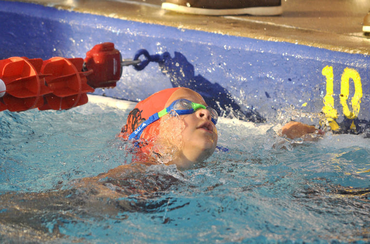 SWIMMING: Water Works takes down Paddlers at home