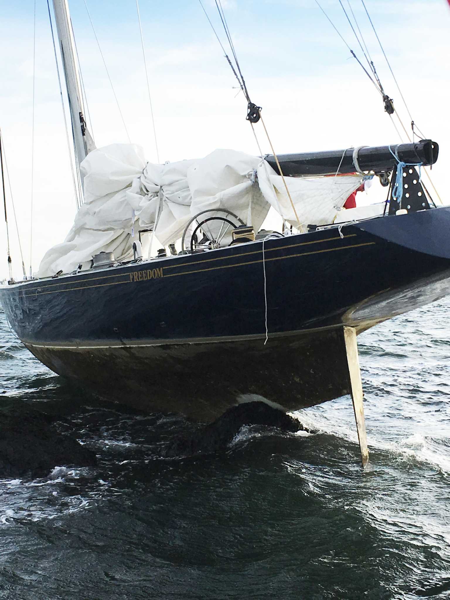 Freedom, a famous racing yacht, on the rocks off Greenwich coastline