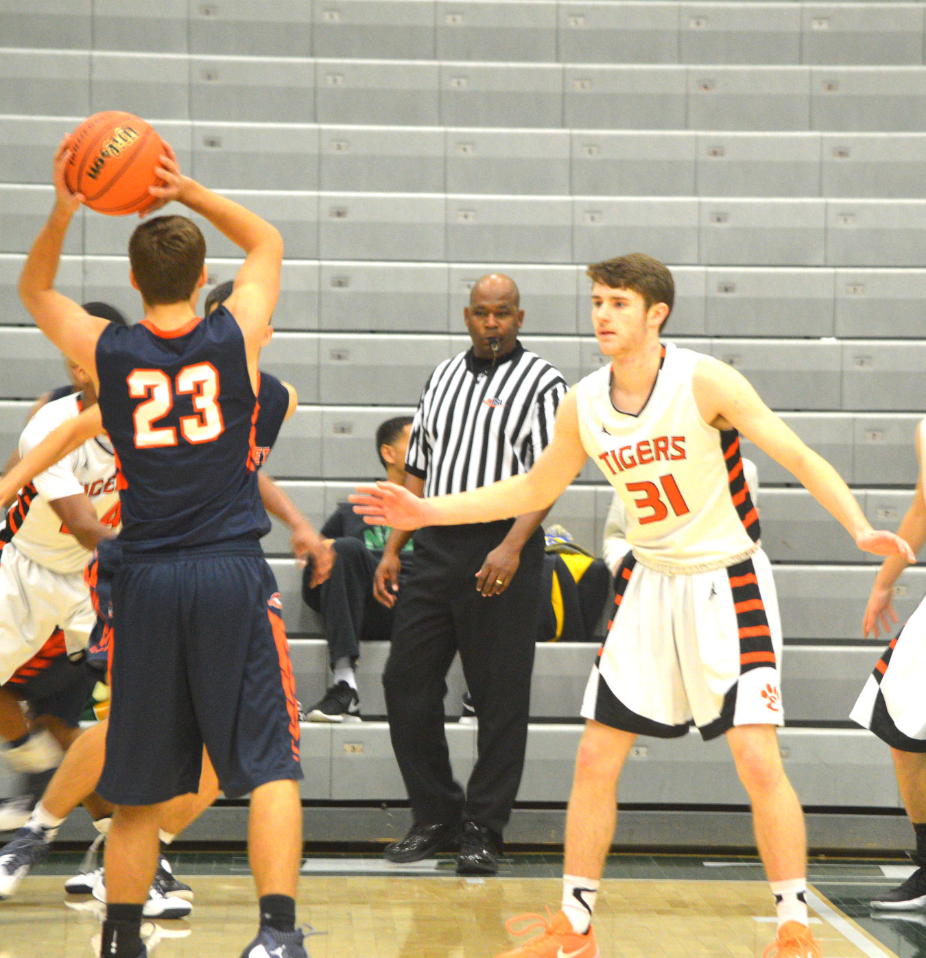 BOYS' BASKETBALL: Edwardsville opens tournament with win