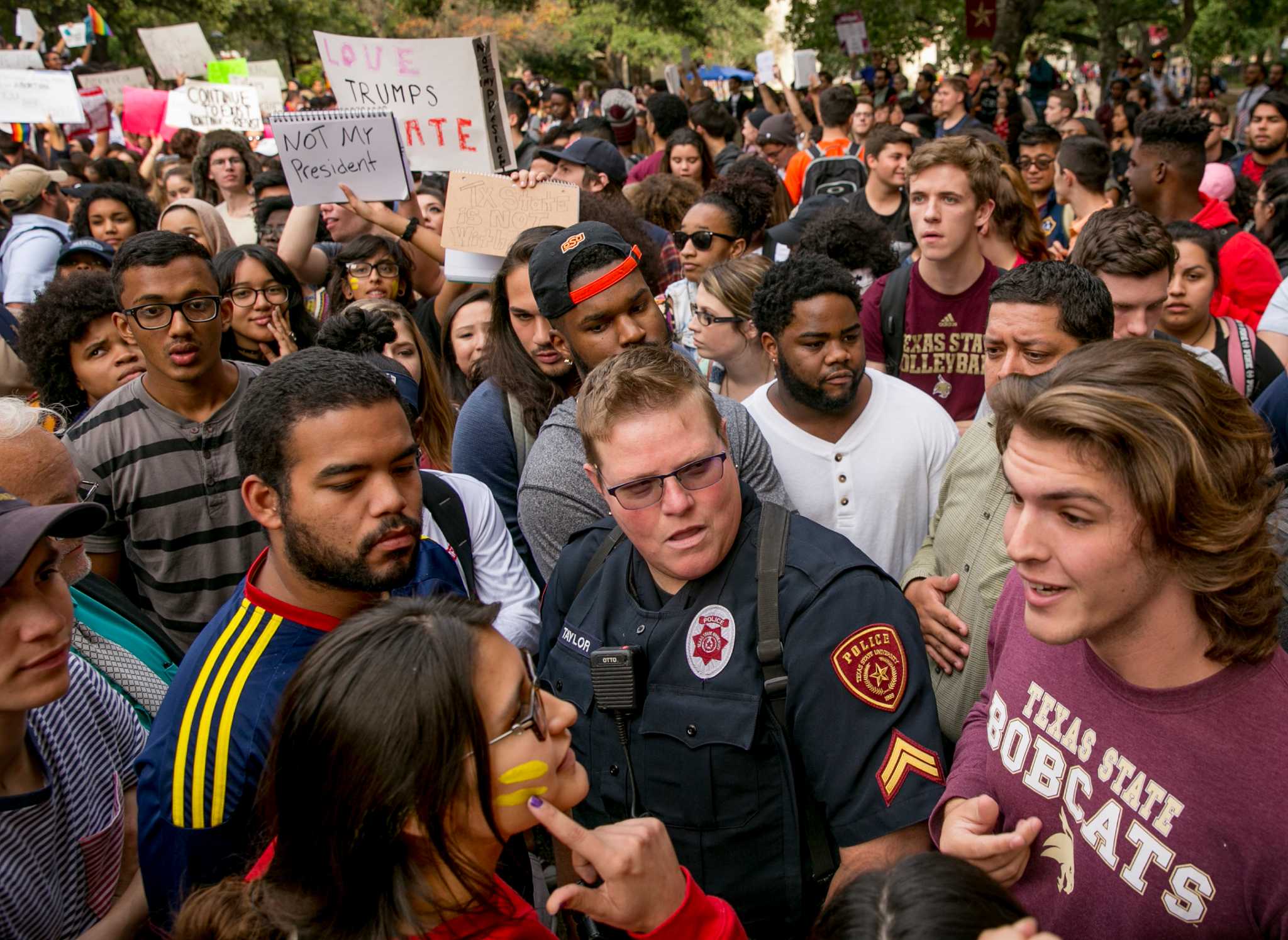 More than 100 Texas State students pack campus in protest of Donald Trump