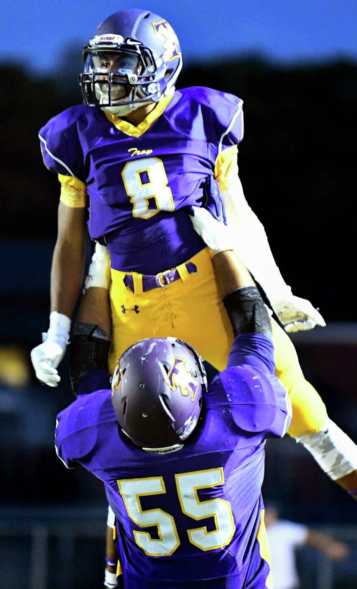 Troy High football propelled by offensive line