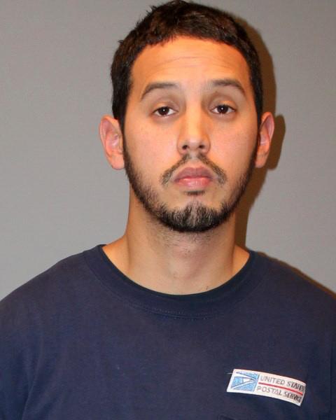 Mailman charged with sex assault