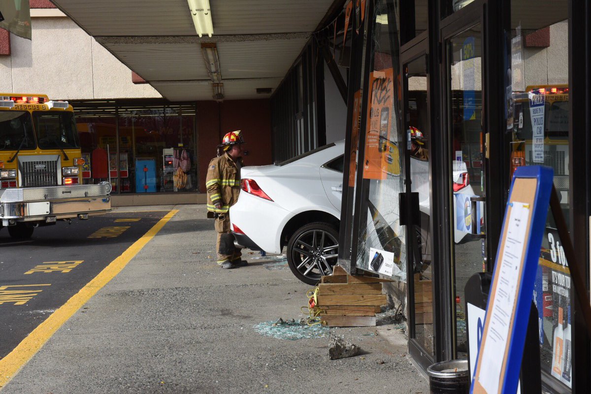 Car crashes into Boost Mobile storefront