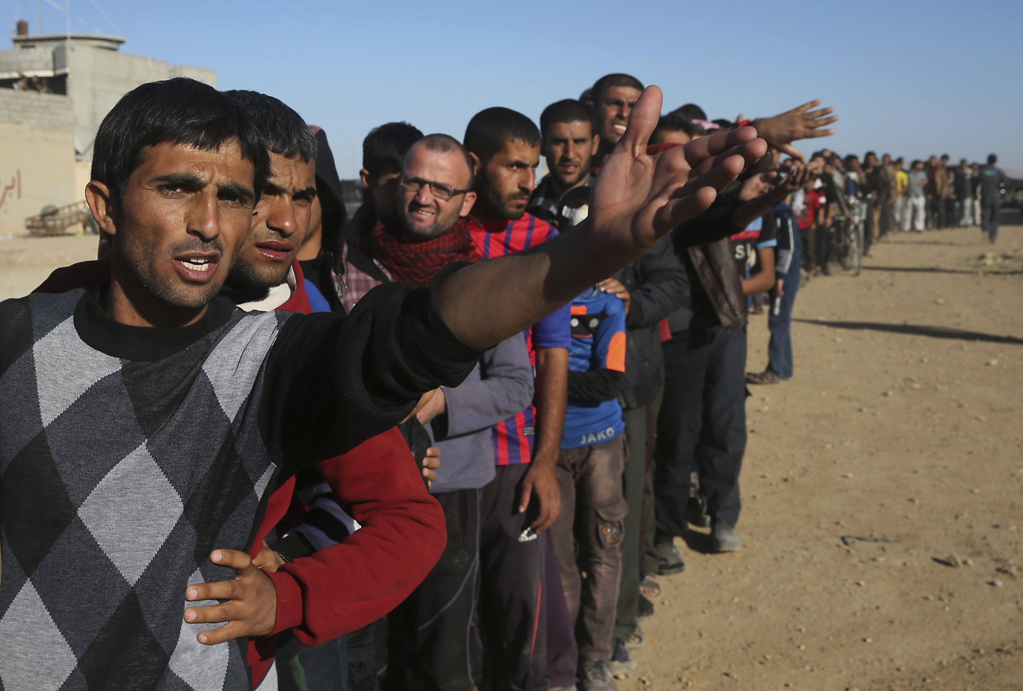 Iraqi troops harden positions against snipers, suicide bombers