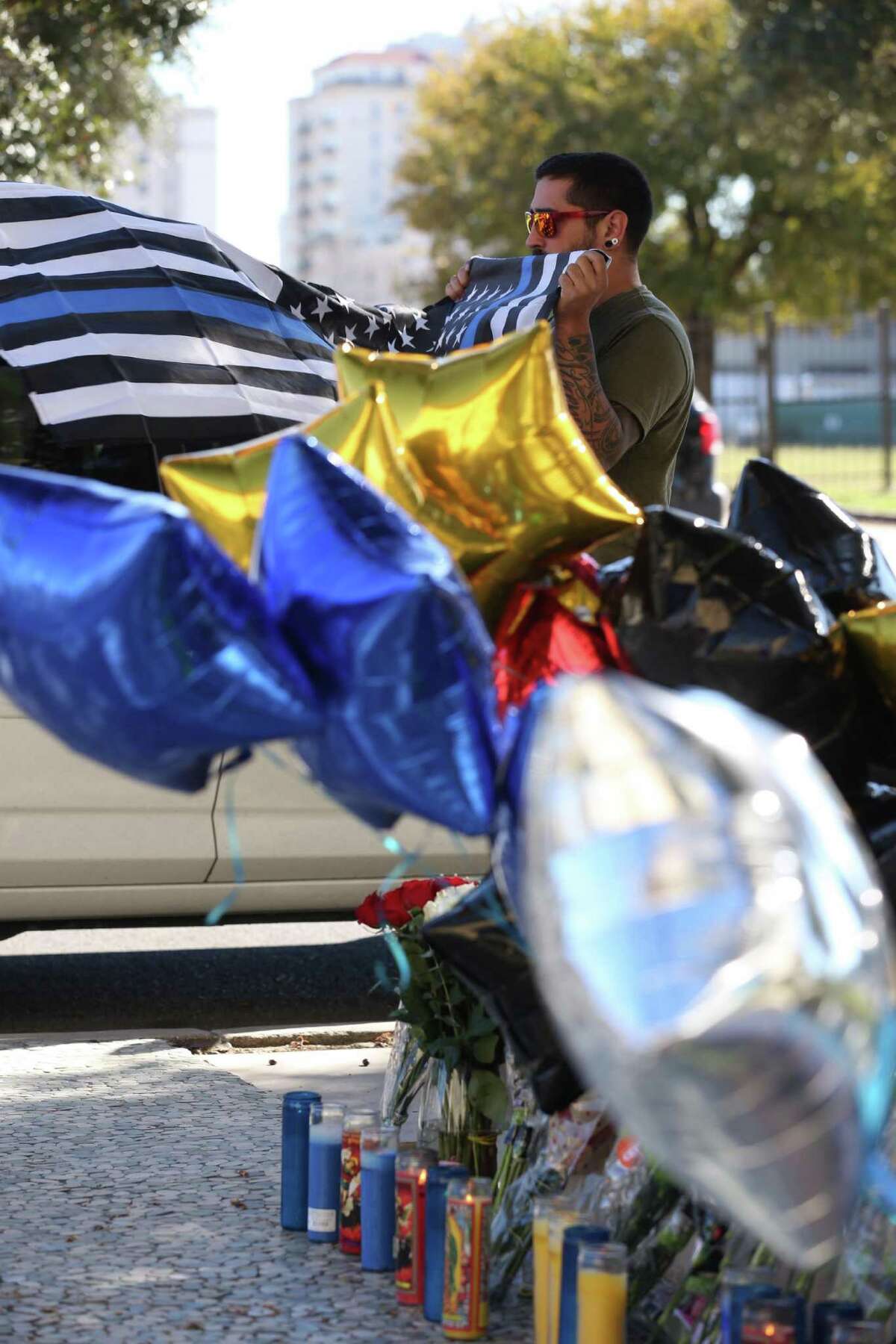 Bexar County deputies salute slain SAPD Det. Benjamin Marconi at ...