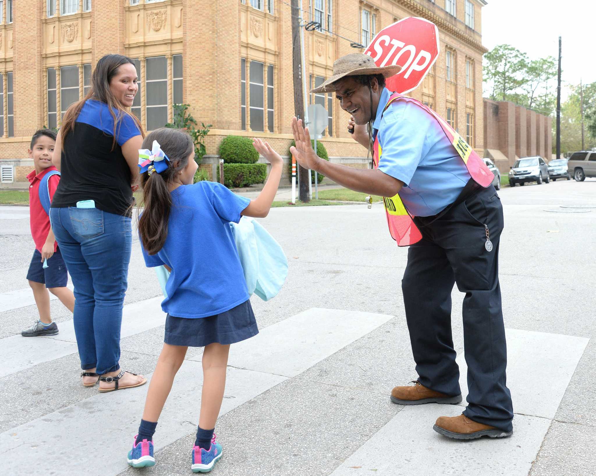 Heights fans raise more than $10K to help crossing guard get new ...